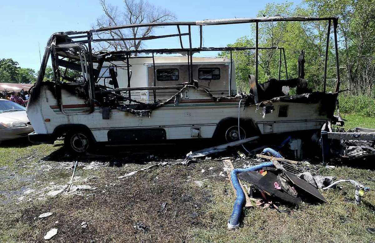 Update: Woman dies after setting fire to trailer, self