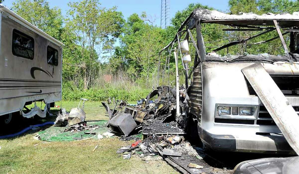 Update: Woman dies after setting fire to trailer, self