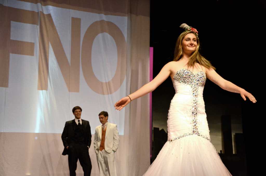 Students walk the runway in annual prom fashion show