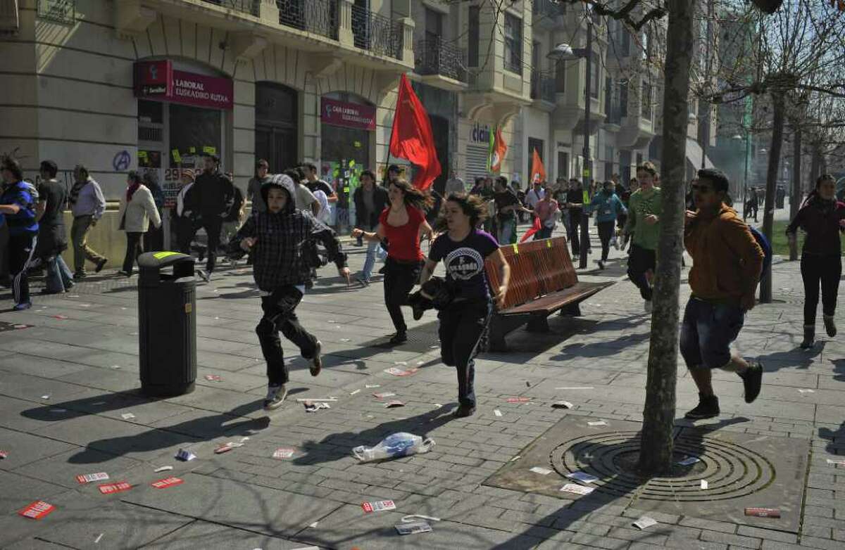 World news in photos: Spain burns in protests and more