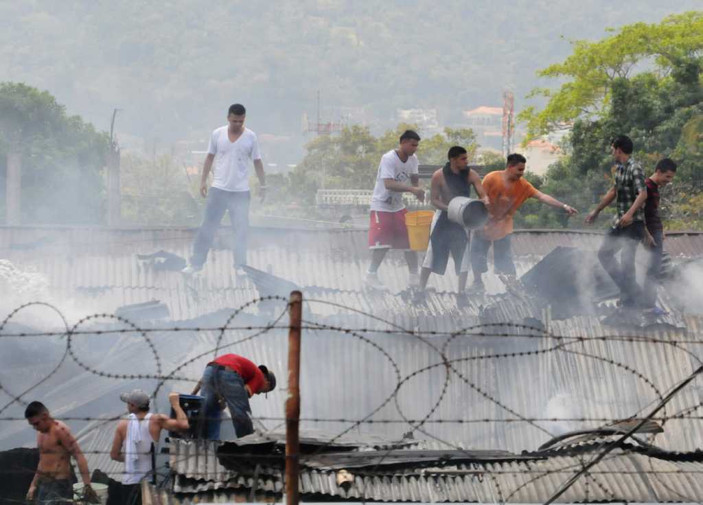 Honduras prison riot, fire kills 13 inmates