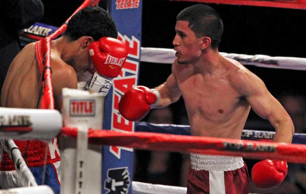 S.A. boxer Lopez wins in return to ring