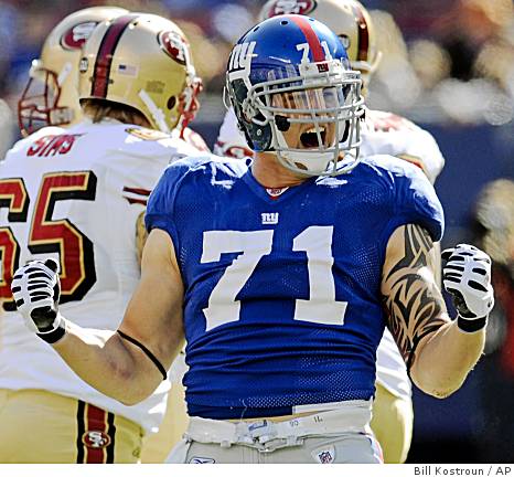 Defensive end Dave Tollefson to sign with Raiders