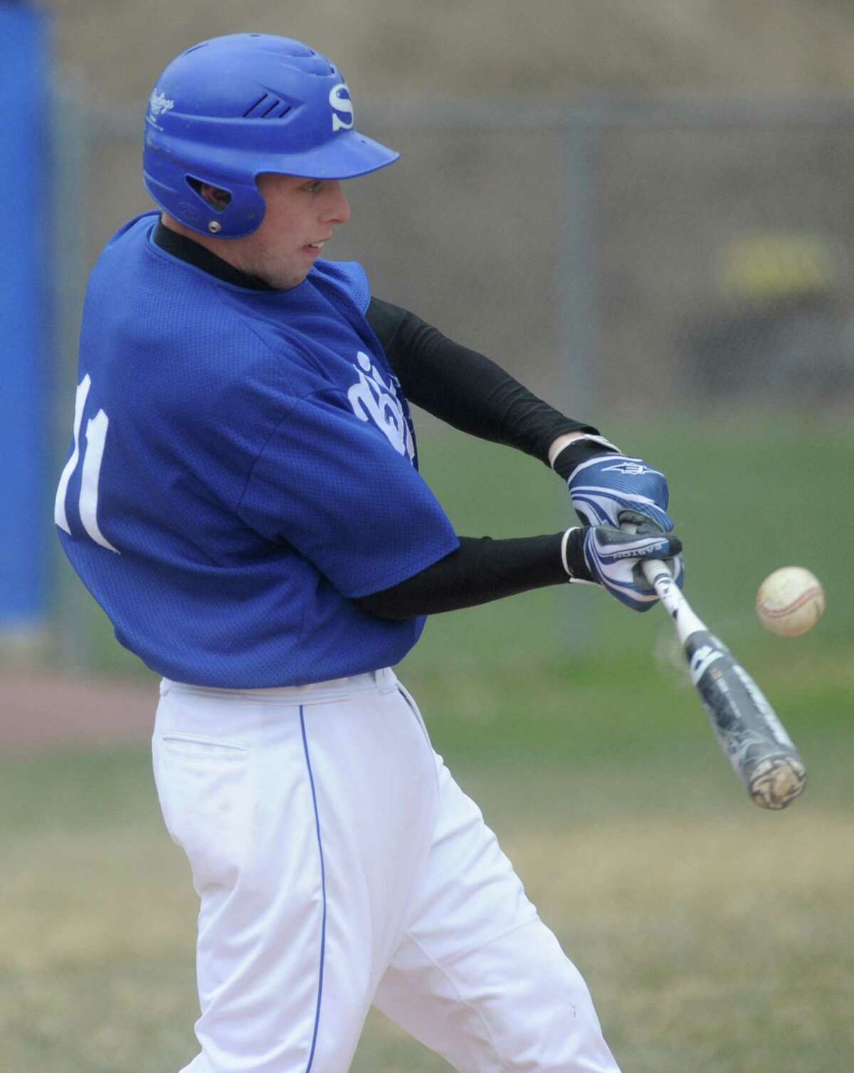 Hitting books and baseballs