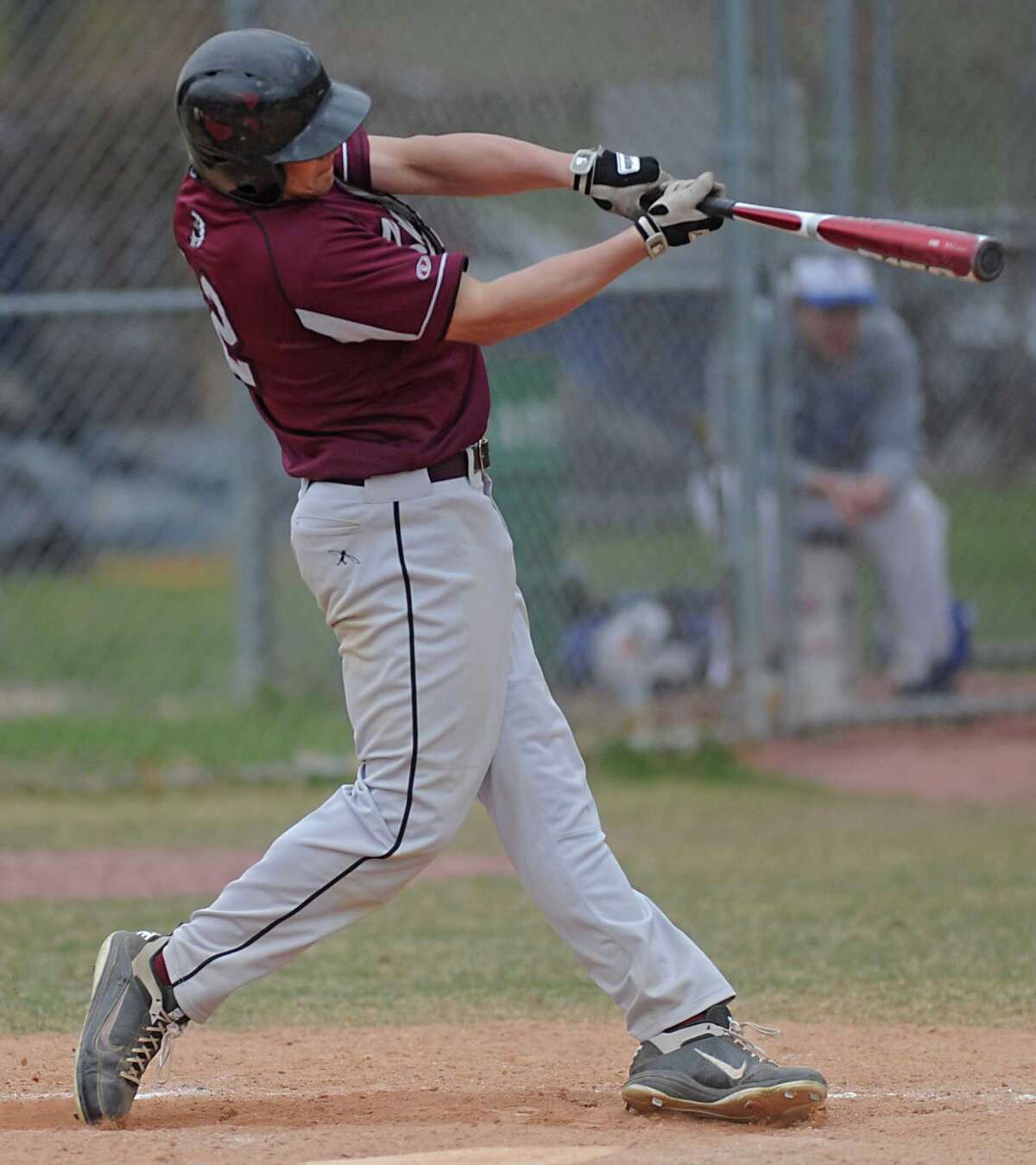 Hitting books and baseballs