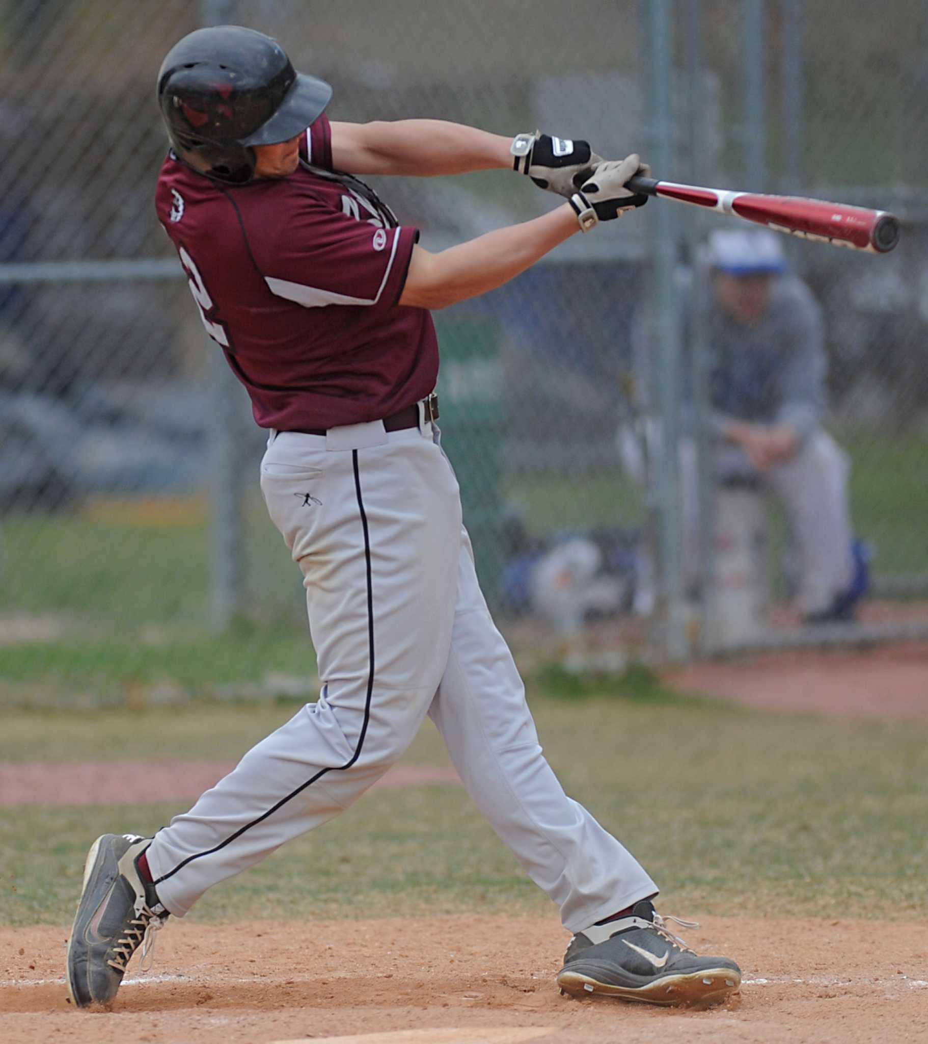 Hitting books and baseballs