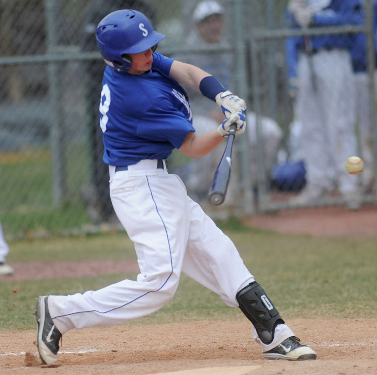 Hitting books and baseballs