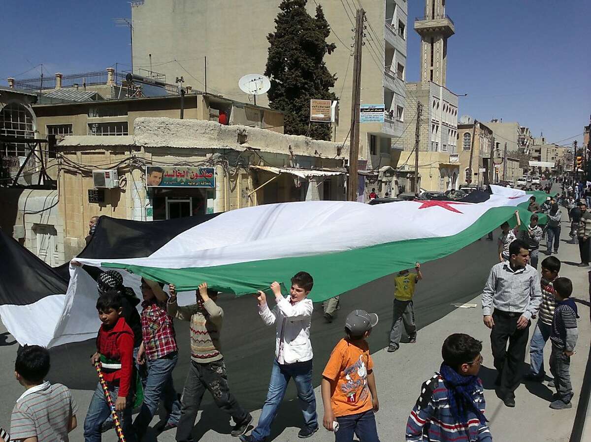 Syria protesters hold huge rallies