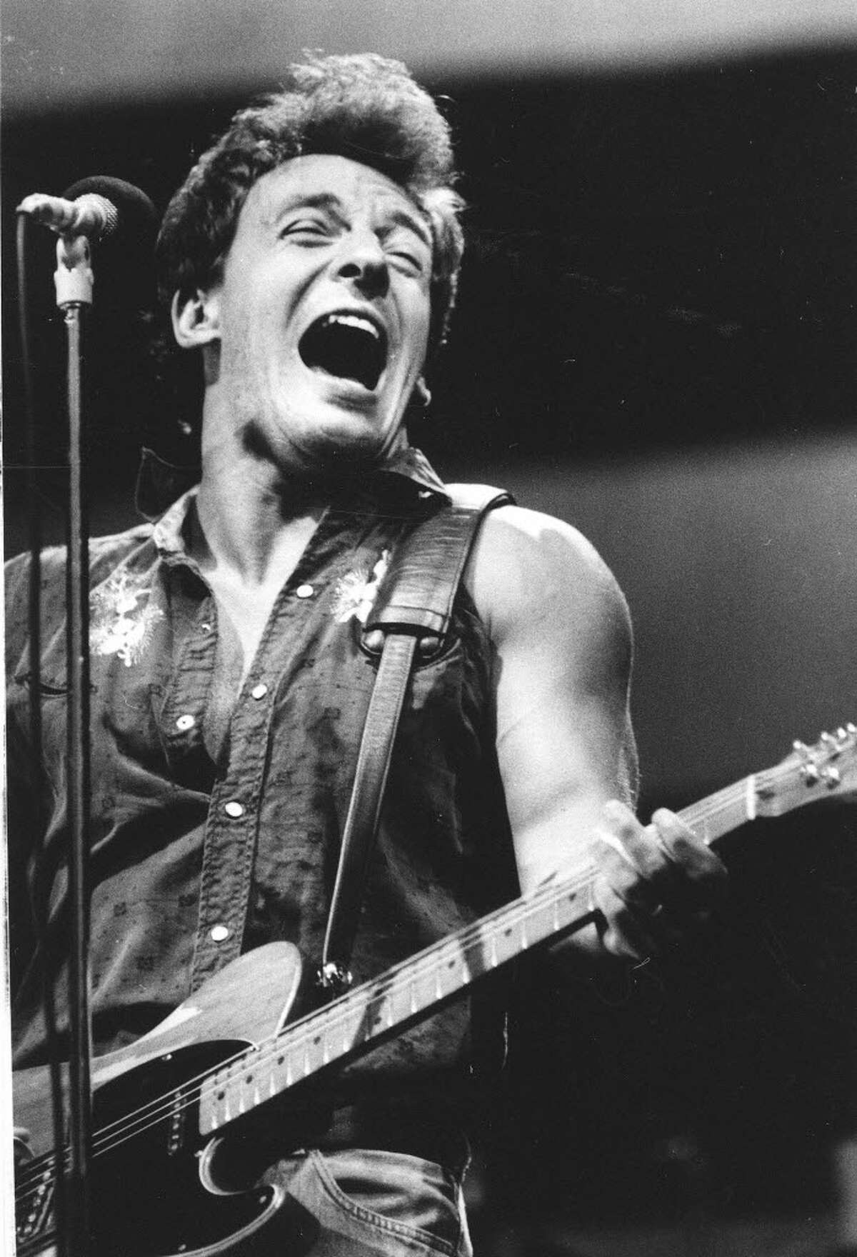 Photos: Every rock-god pose struck by Springsteen