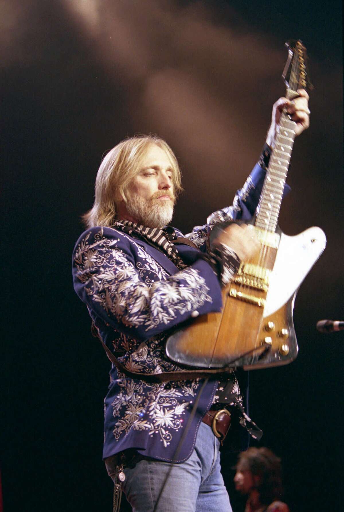 Police arrest guard, recover Tom Petty guitars