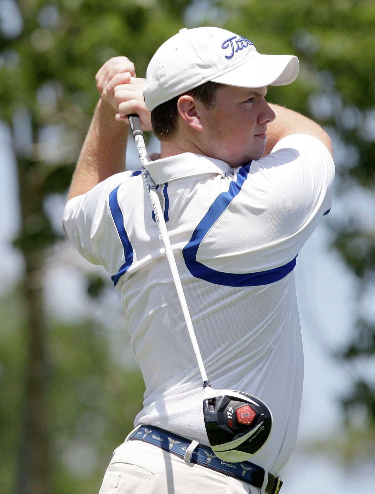 Travis boys win Region III-5A golf championship