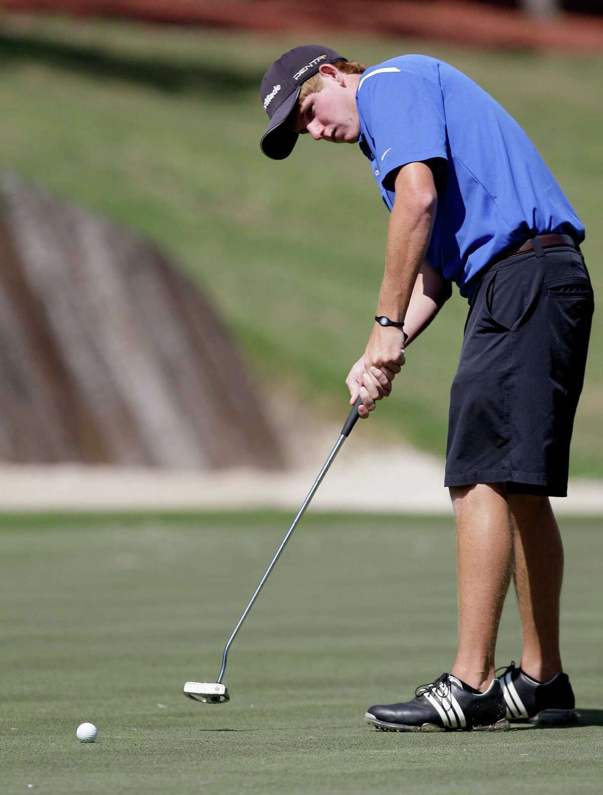 Travis boys win Region III-5A golf championship