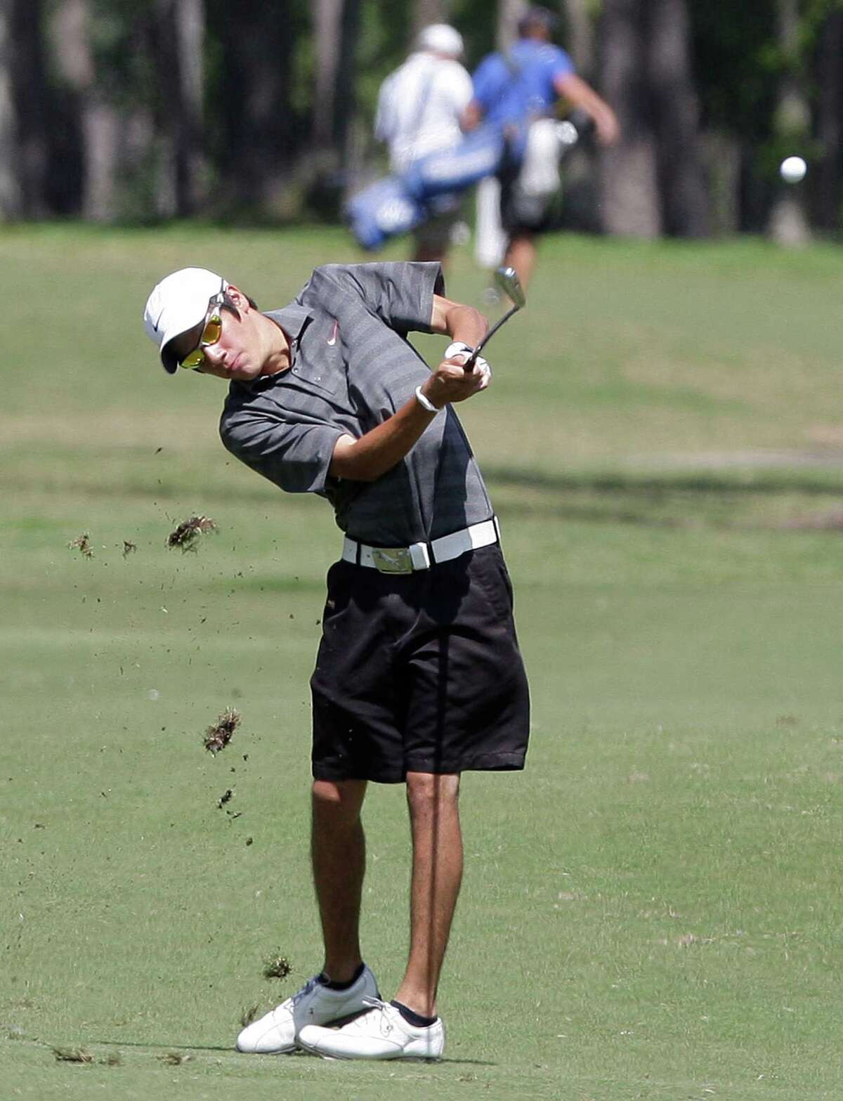 Travis boys win Region III-5A golf championship