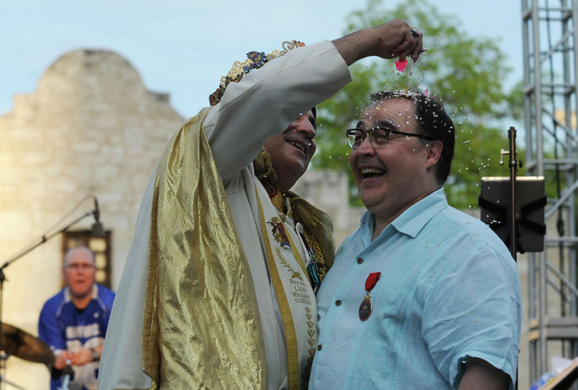 Towering hats, pins on parade mark Fiesta's kickoff
