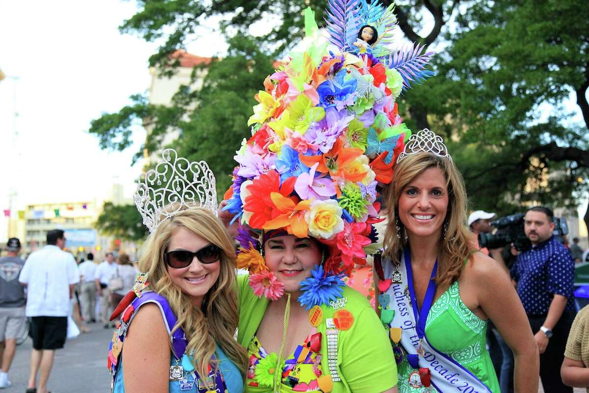 Towering hats, pins on parade mark Fiesta's kickoff