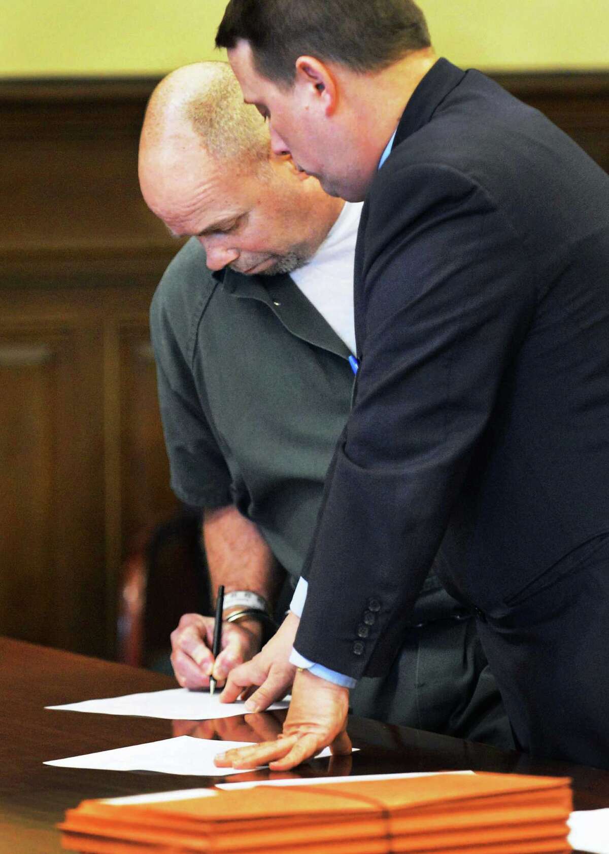 Man sentenced in deaths of son, girlfriend