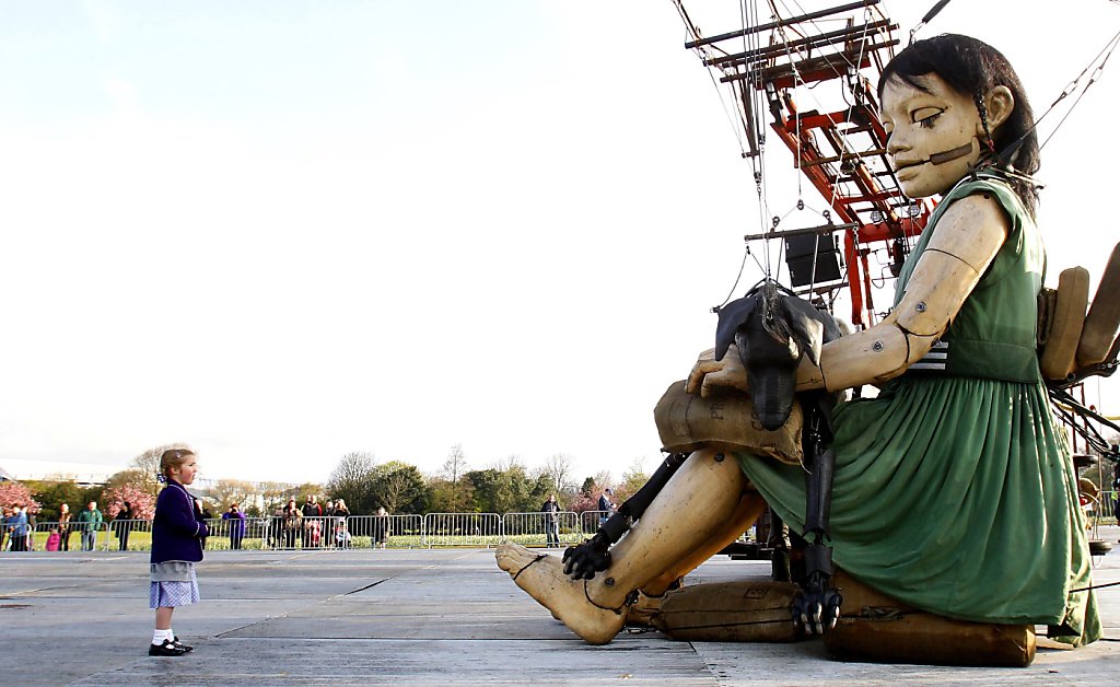 Giant puppets roam streets of Liverpool