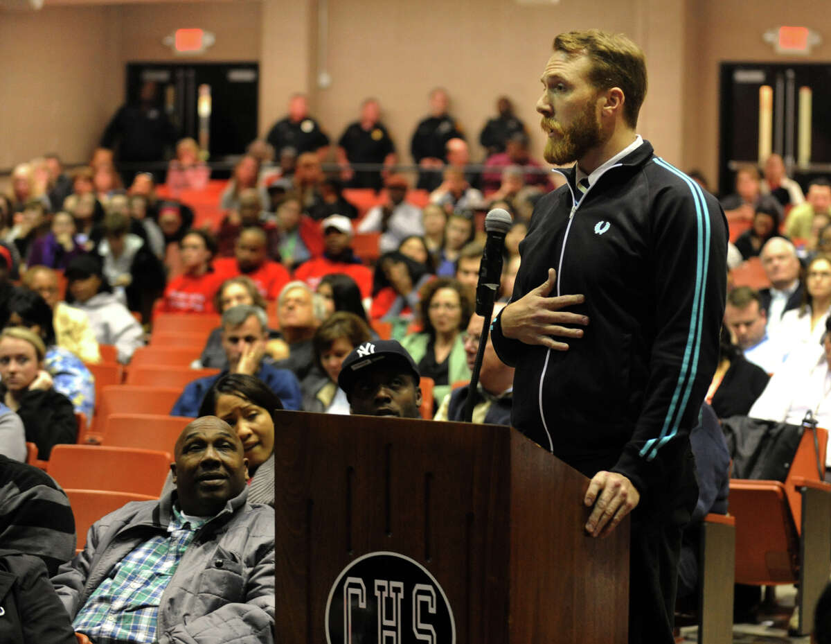 Loud crowd greets Malloy’s education reform pitch