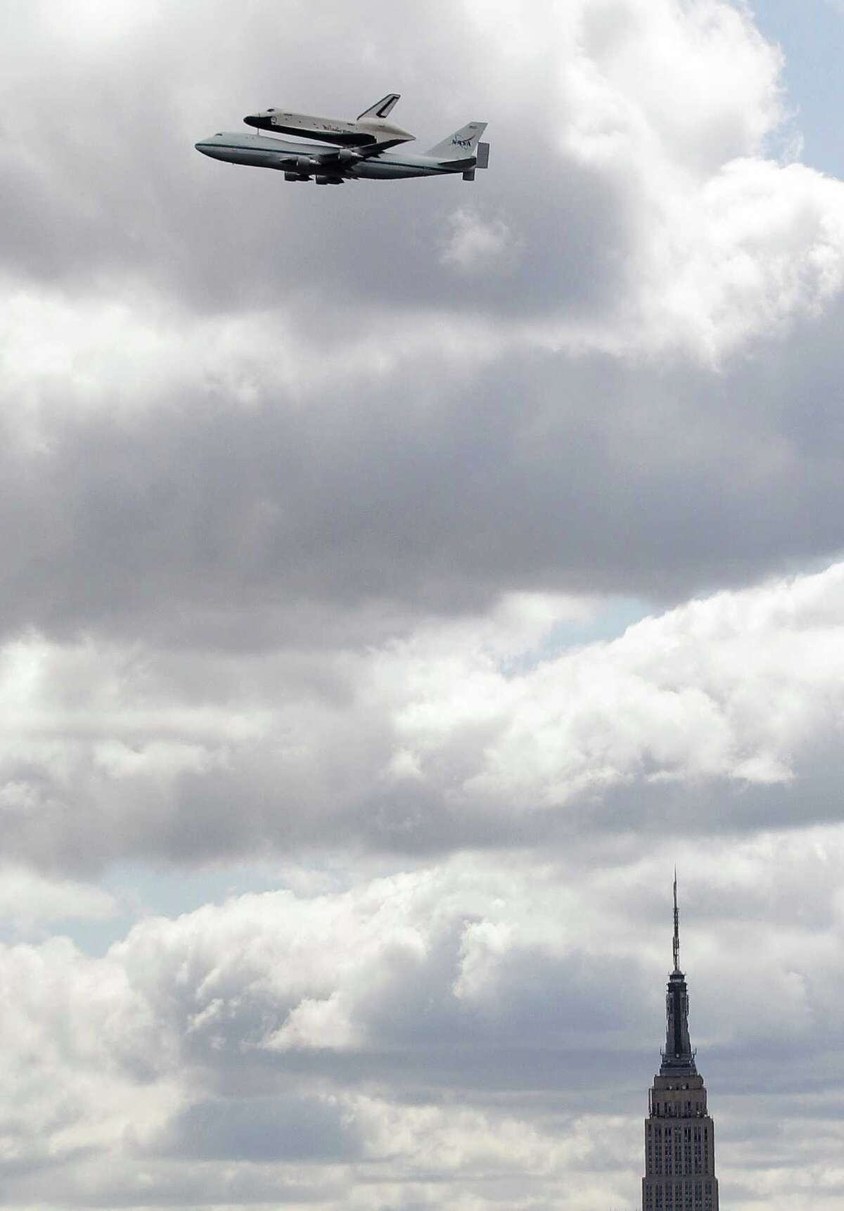 News of the world in photos: Space shuttle takes Manhattan