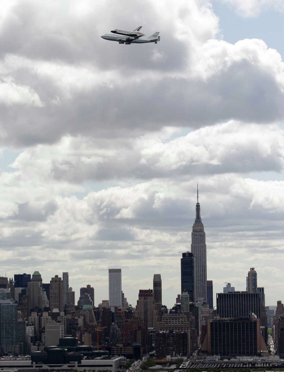 News of the world in photos: Space shuttle takes Manhattan