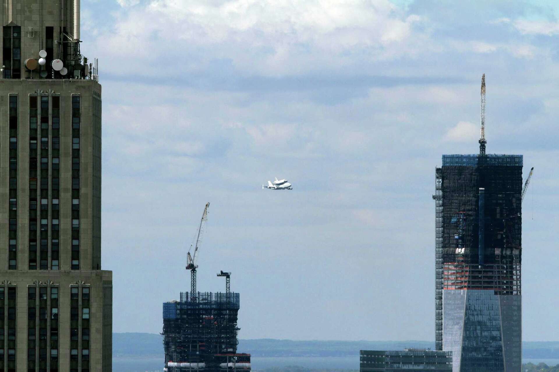 News of the world in photos: Space shuttle takes Manhattan