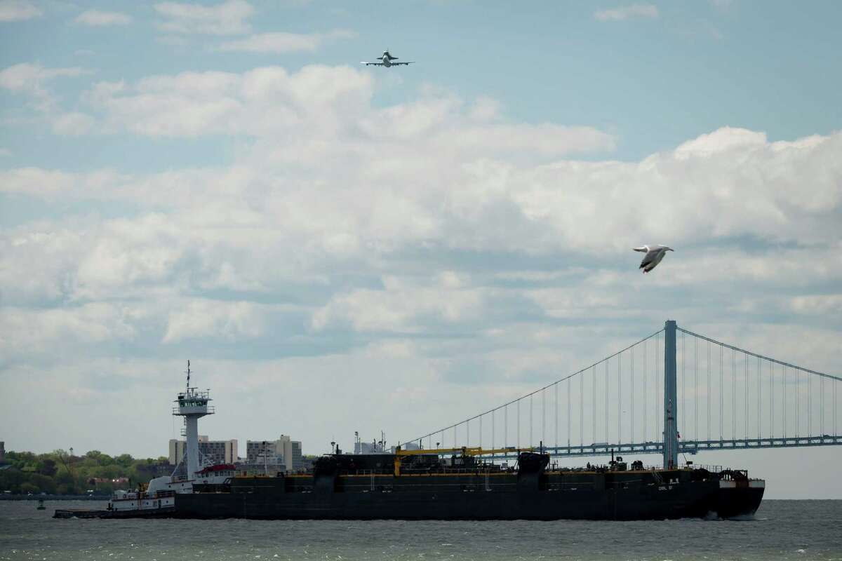 News of the world in photos: Space shuttle takes Manhattan