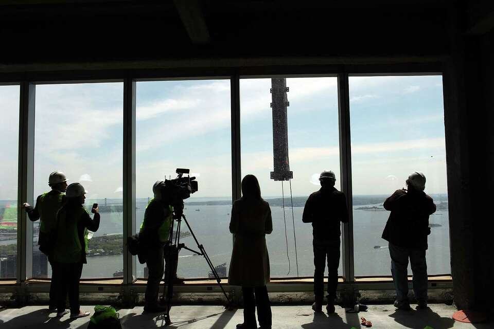 News of the world in photos: Tower rises over site of 9/11 tragedy