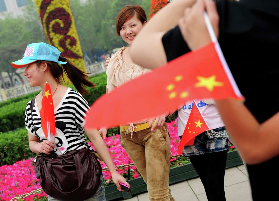 News of the world in photos: May Day protests, parades, pageants ...