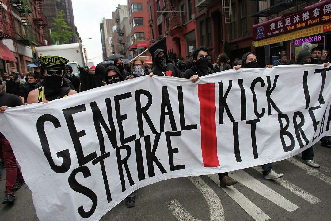 News of the world in photos: May Day protests, parades, pageants