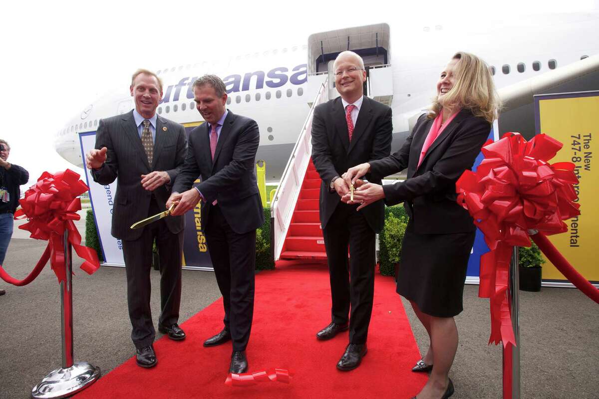 First airline Boeing 747-8 Intercontinental leaves Everett