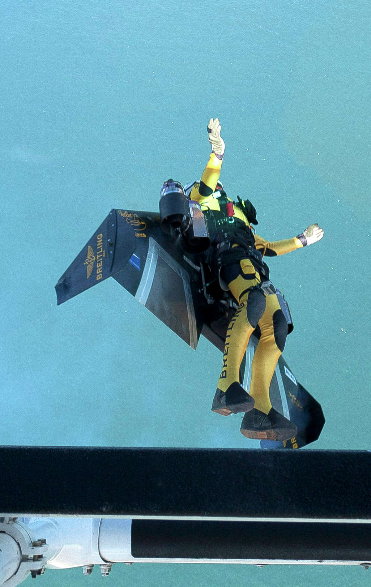 Stunning images as 'Jetman' flies over Rio