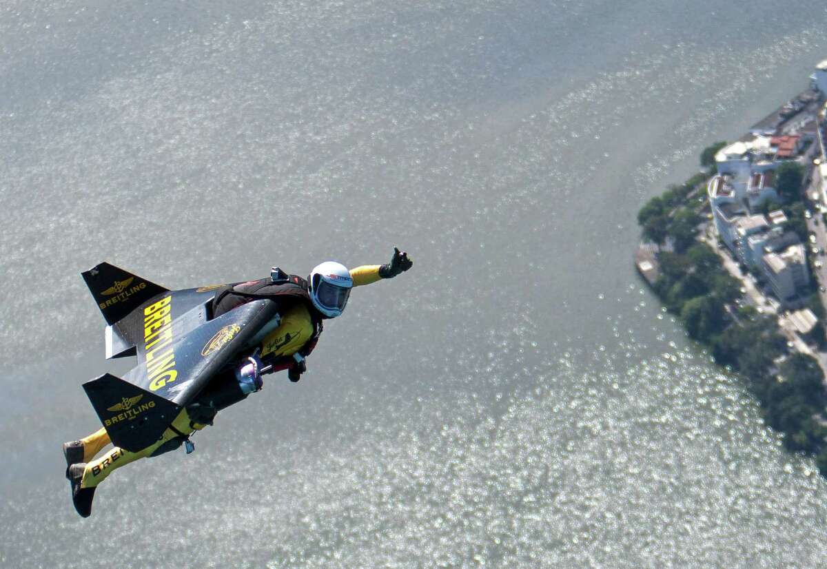 Stunning images as 'Jetman' flies over Rio