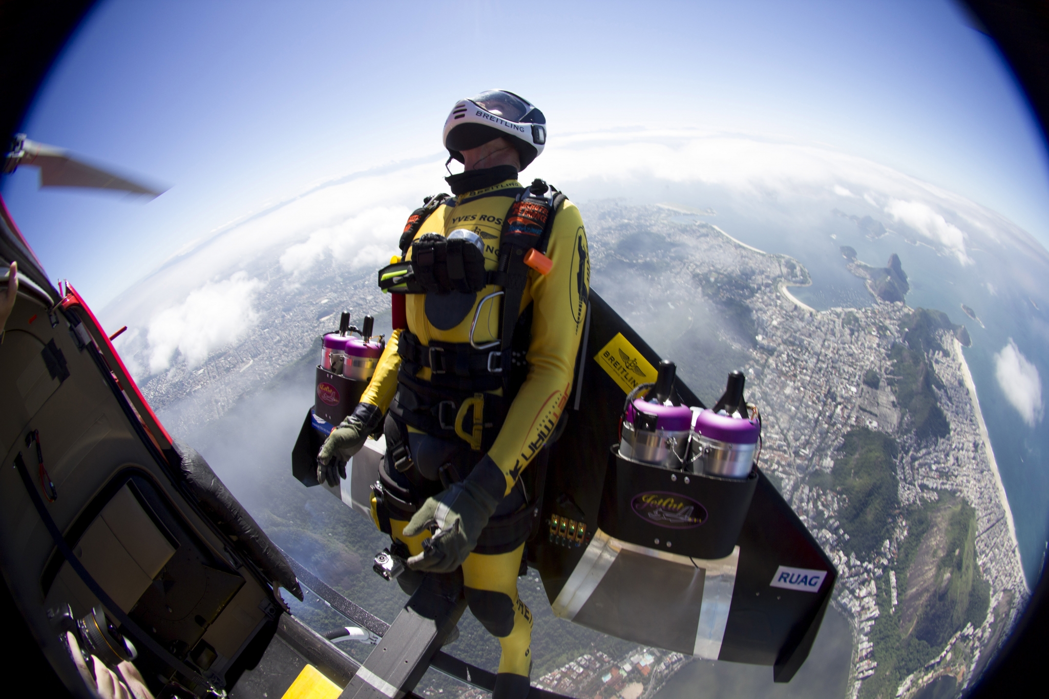 Stunning images as 'Jetman' flies over Rio