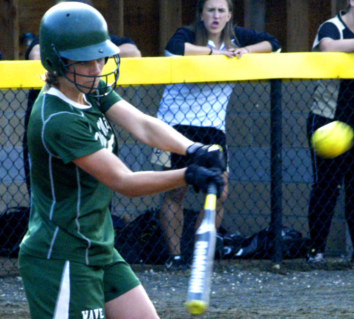Defense keys Green Wave softball to playoff contention