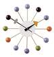 Colorful ball clocks, classic and knockoff