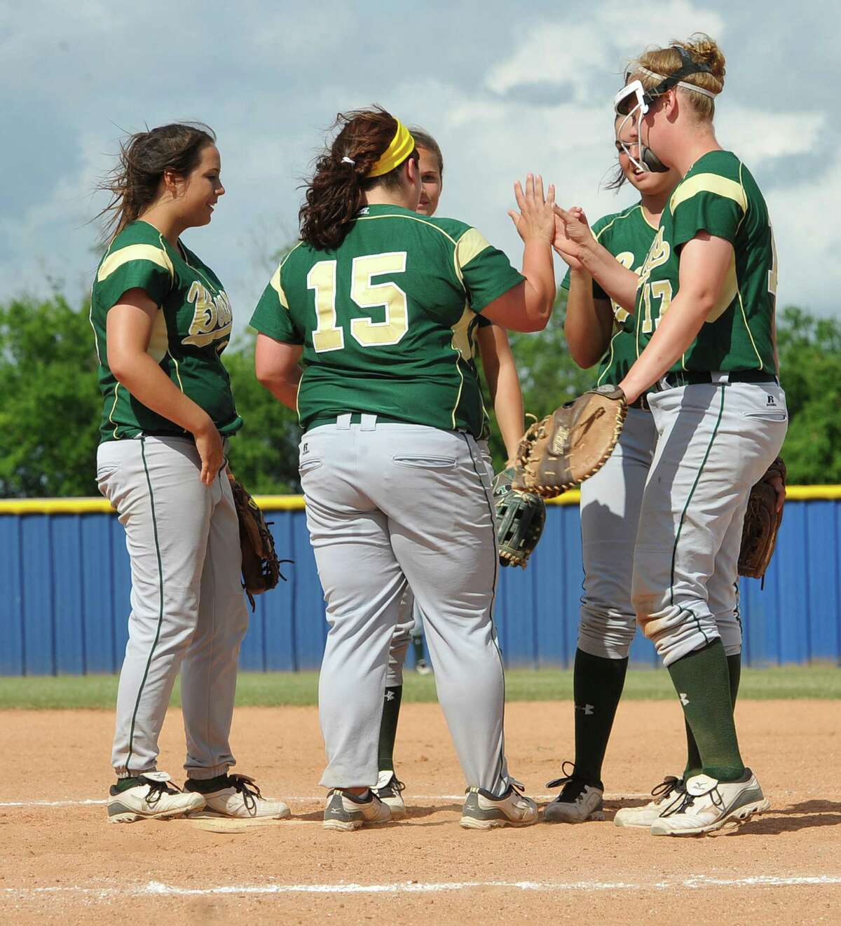 Bat-licking superstition boosts LC-M softball