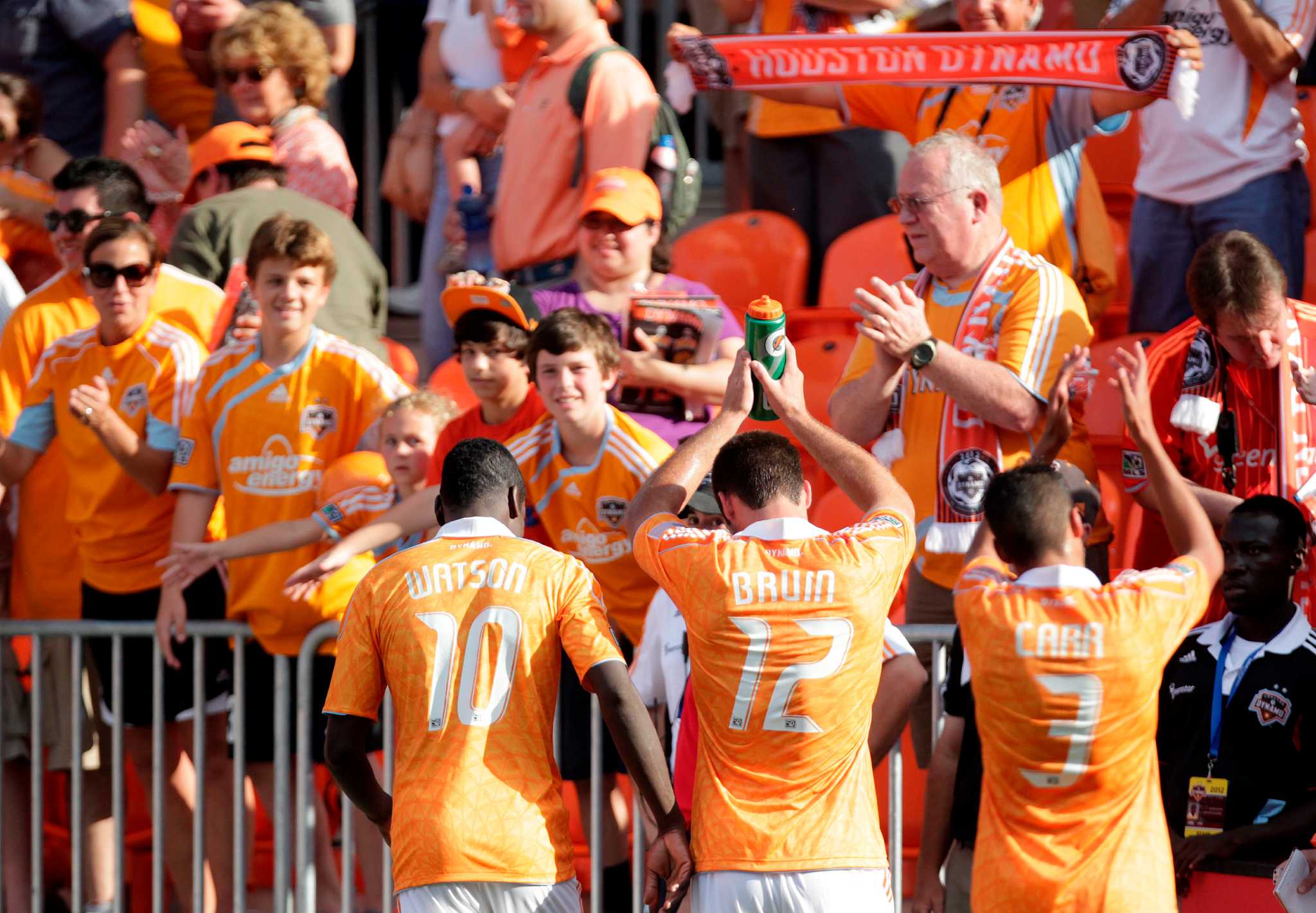 Long-awaited opening of Dynamo's stadium greeted with group hug