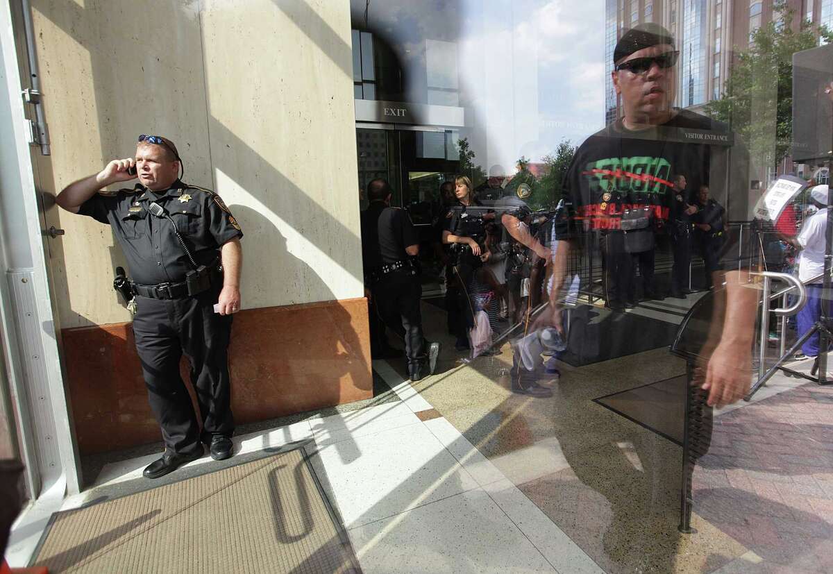 Officer's intent key for jury; protesters demand answers