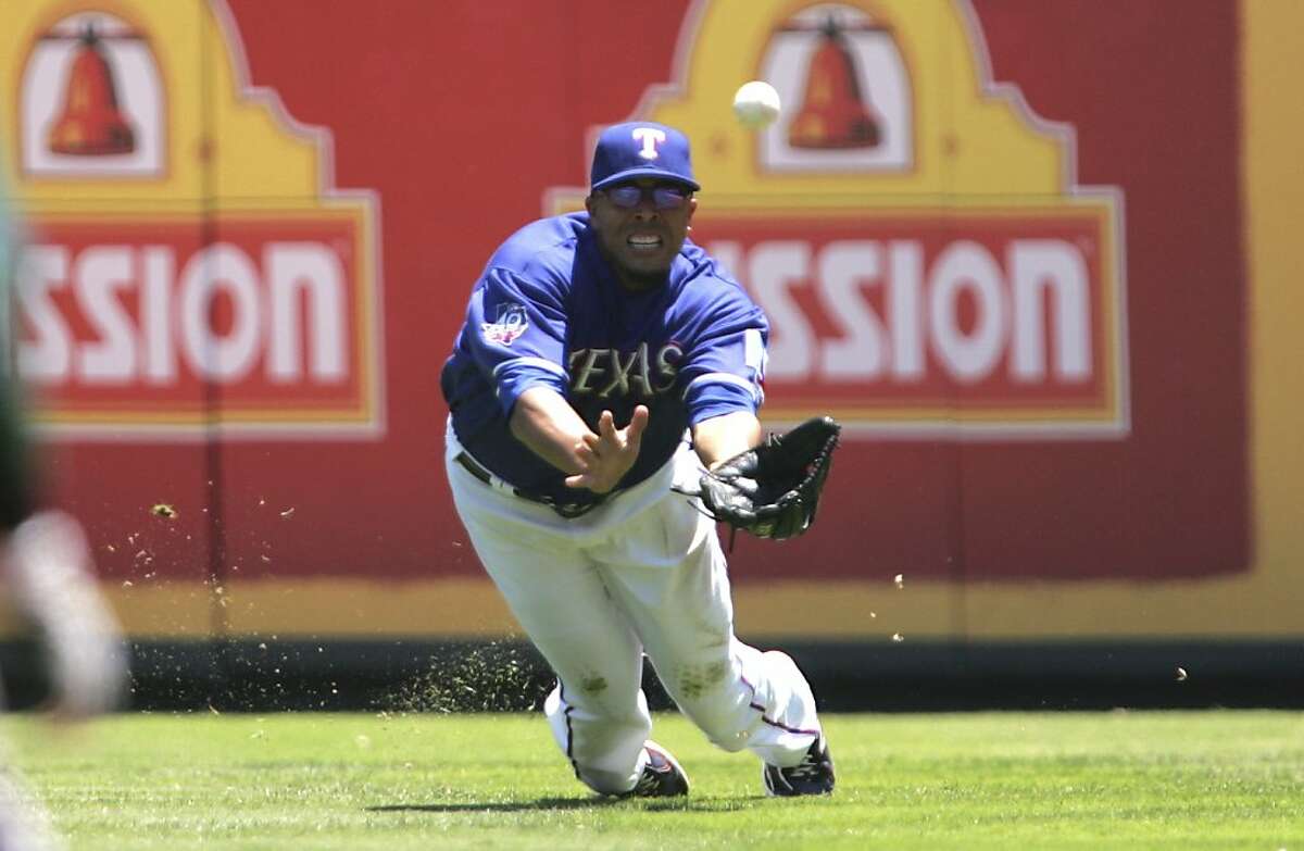 A's fight back, beat Rangers in 10th