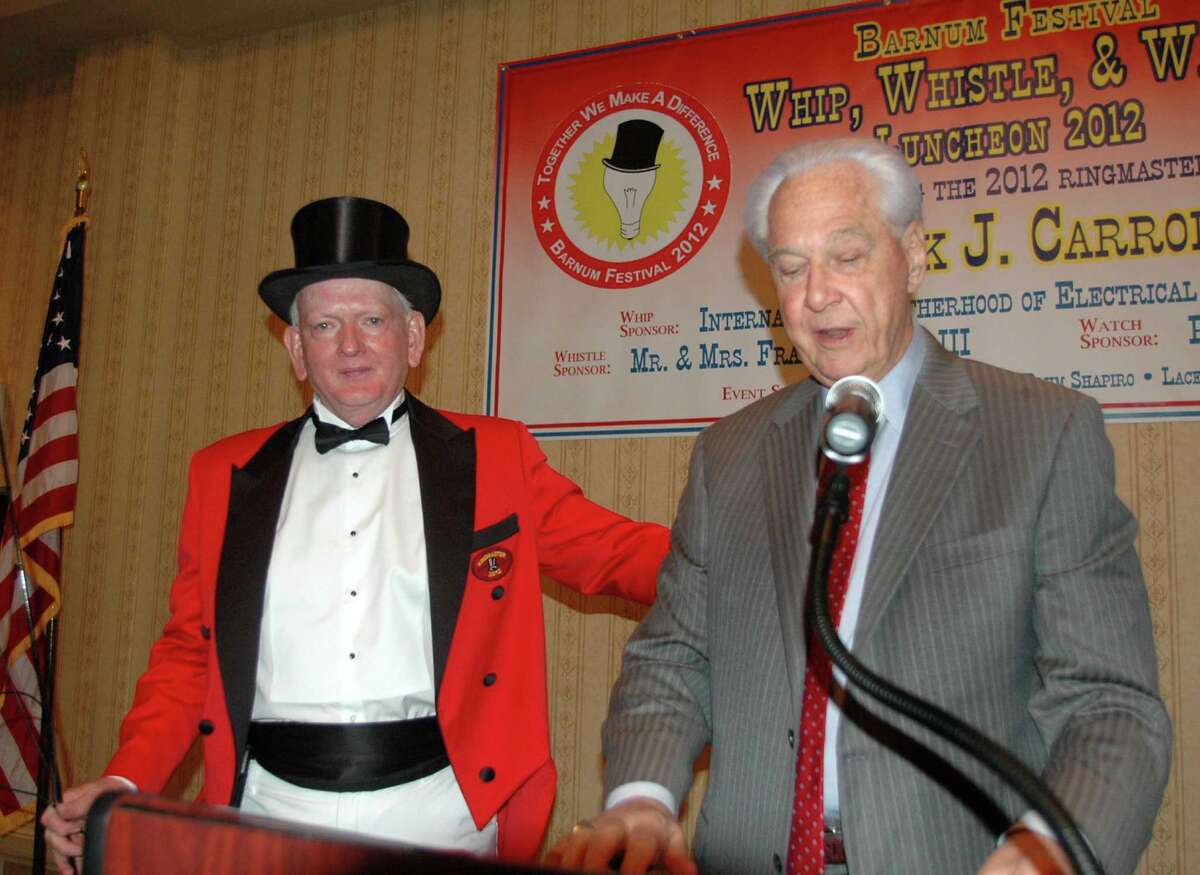 Ringmaster Frank Carroll Jr. accepts whip, whistle and watch