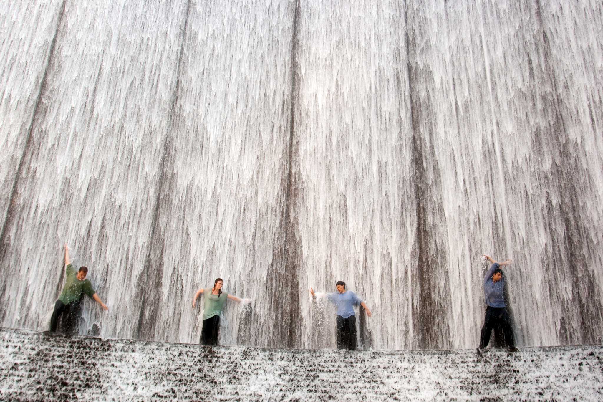 Waterfall a shimmering stage for dancers