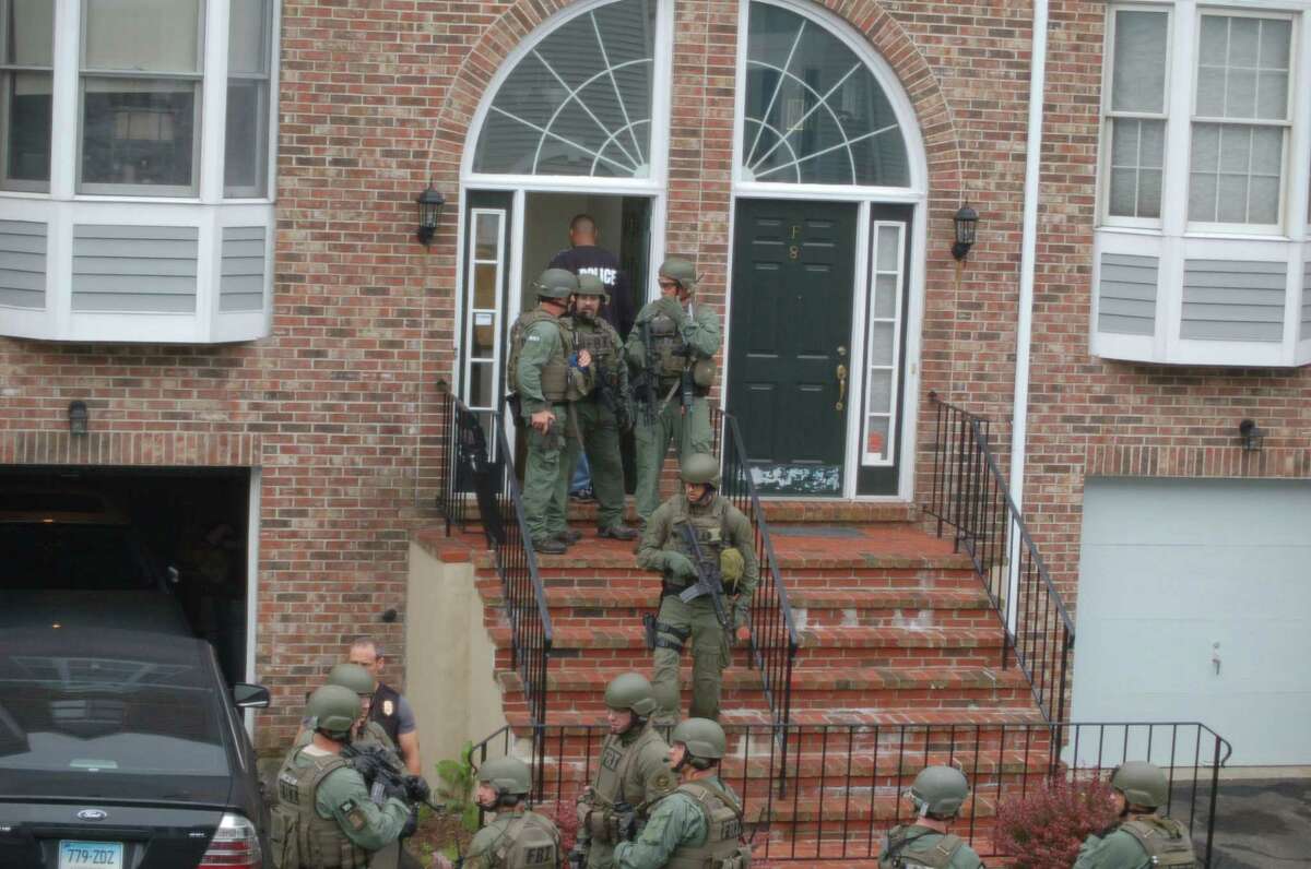 FBI, state police raid Bridgeport condo