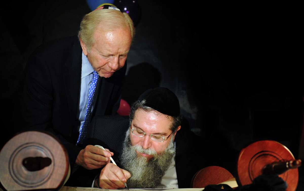 Lieberman helps finish Stamford school's Torah
