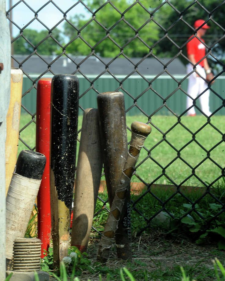Broken baseball bats have a cemetery at Bridge City - Beaumont Enterprise