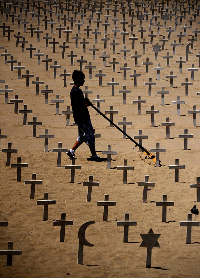 A sea of crosses stands in remembrance of fallen