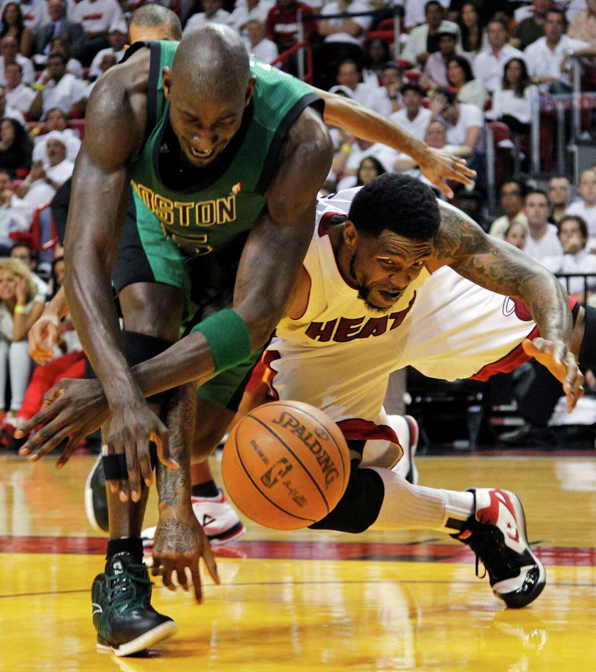 Heat outlast Celtics in overtime