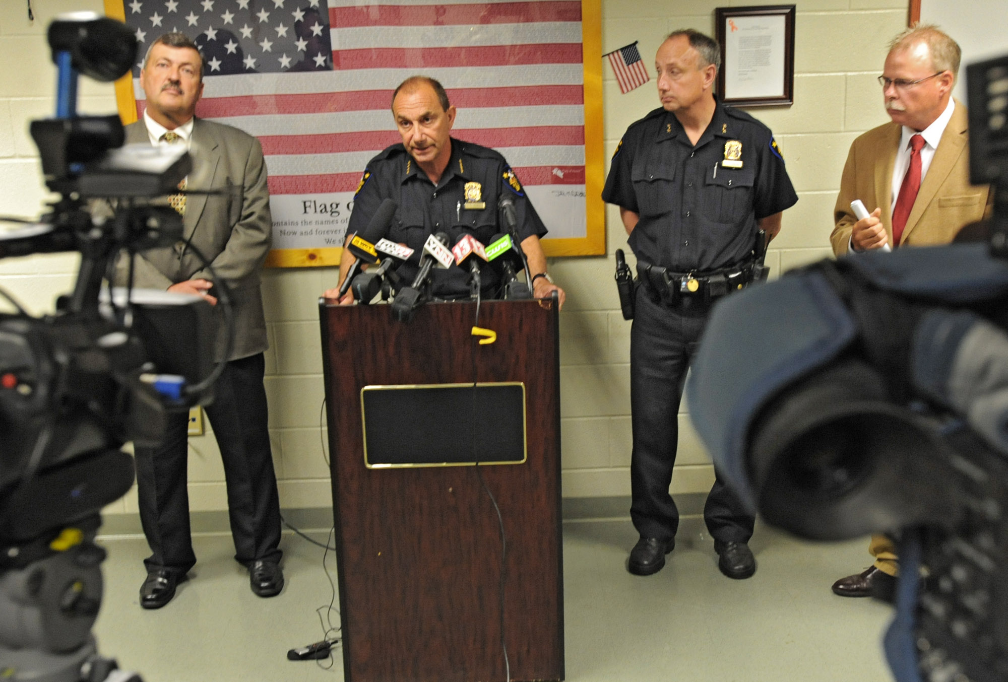 Cop's arrest roils Troy