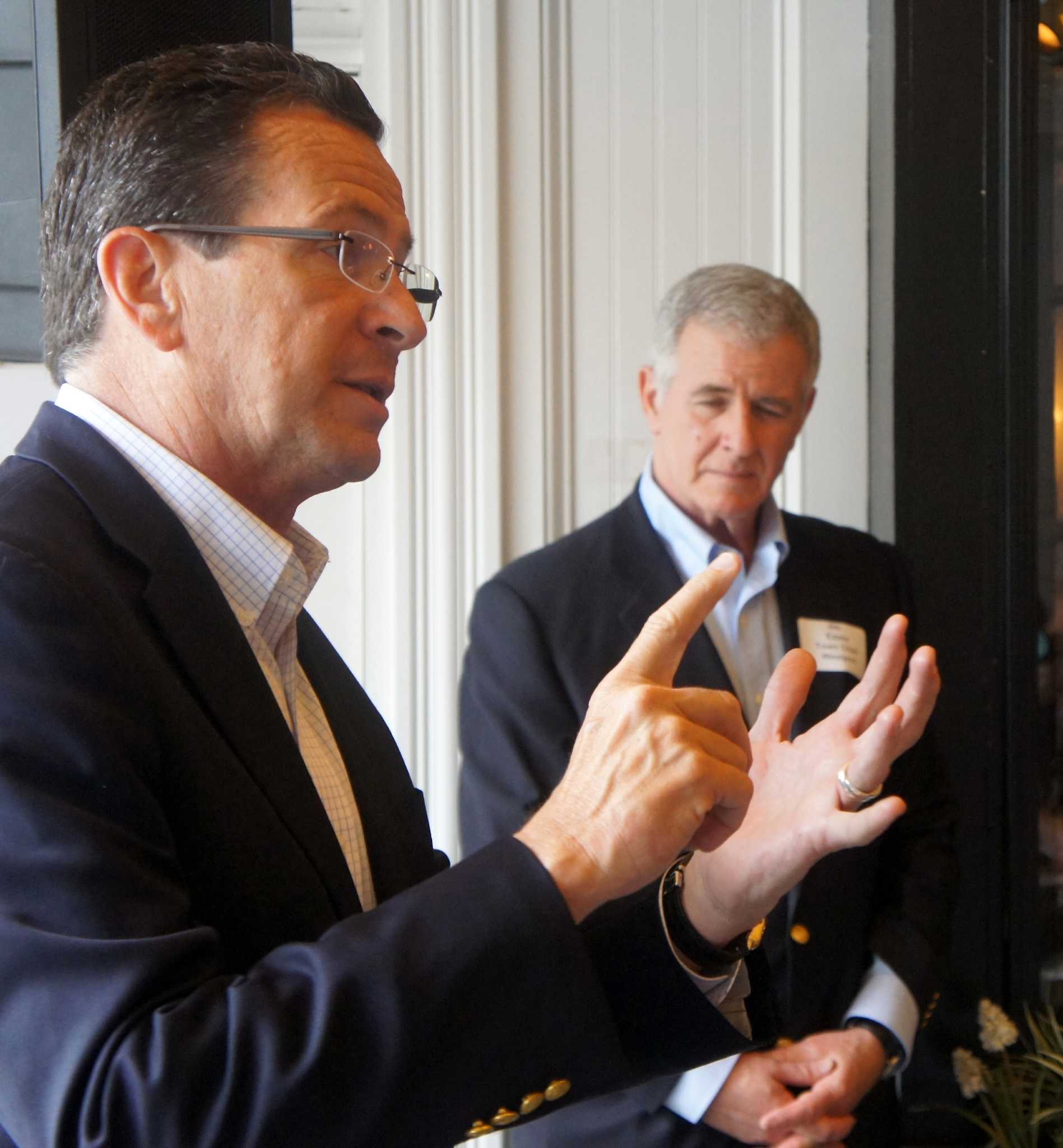 Malloy defends Democrats' record in Westport foray