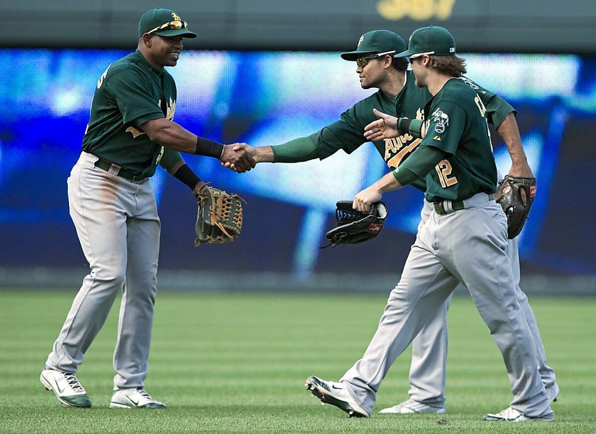 A's pound Royals to end losing streak