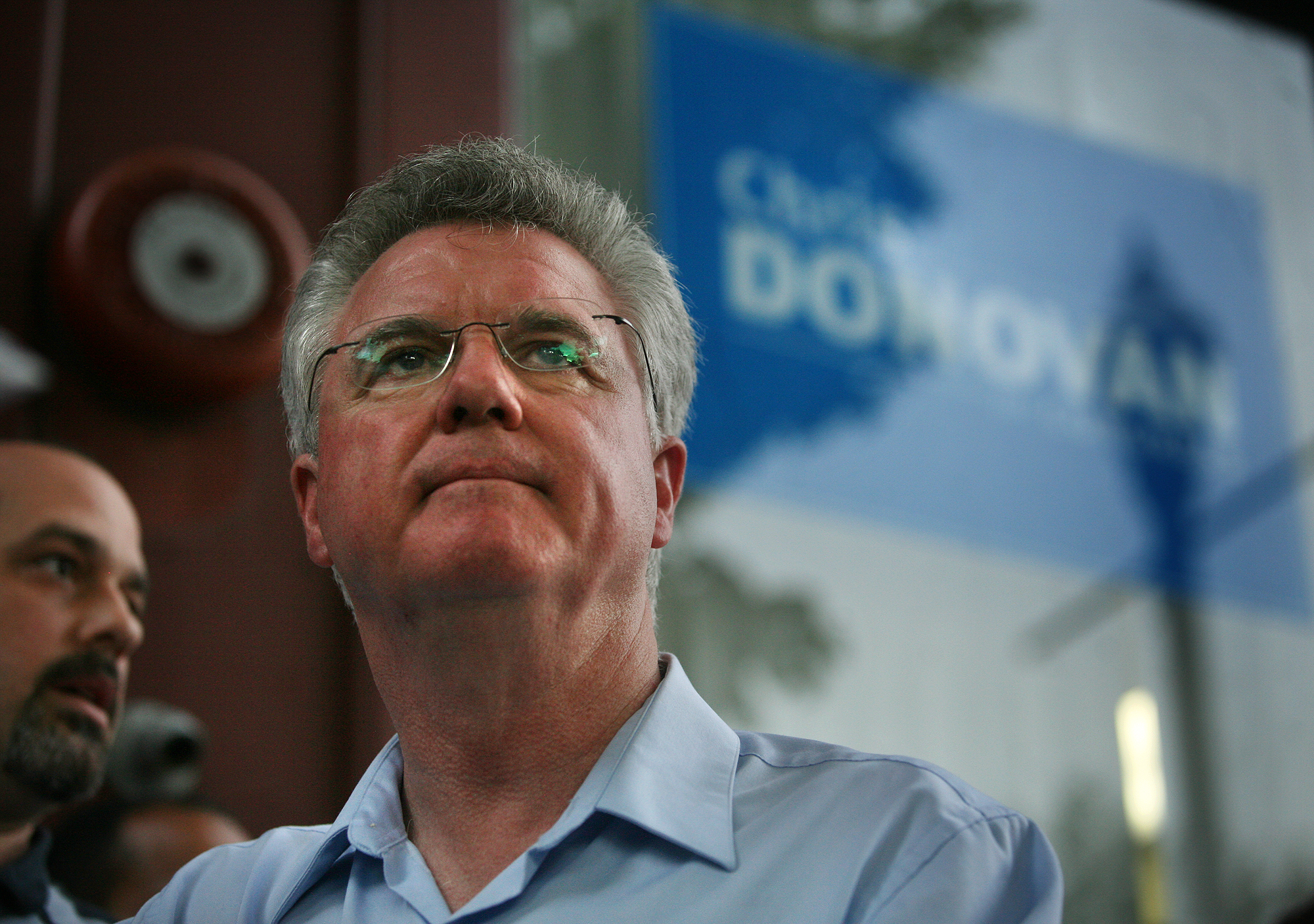 Donovan vows to stay in race, 'shocked' by Braddock's arrest